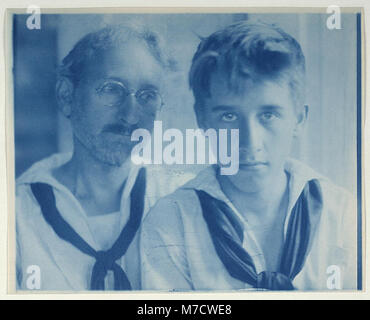 A portrait of Maynard White, dressed in a suit and cap, highlighting ...