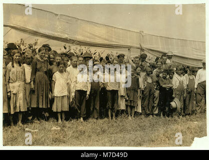 The image depicts child laborers working in the Newton Cotton Mills in ...