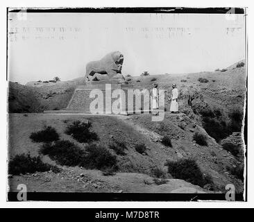 A basalt lion sculpture from ancient Babylon, Iraq, featuring intricate ...