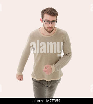 modern young man confidently goes forward. Photo in full length Stock ...