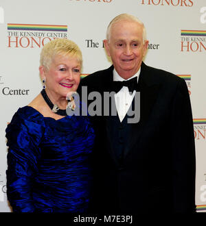 J.W. Marriott, Jr. and his wife, Donna, arrive for the formal Artist's ...