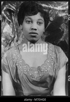 A portrait of renowned opera singer Leontyne Price, featuring her with the Saralee doll ...