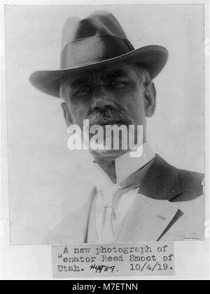 A formal portrait of Senator Reed Smoot, a prominent American ...