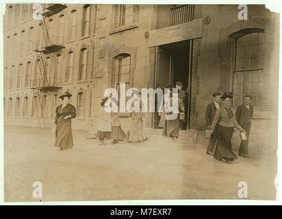 This photograph shows workers leaving a mill during a strike in Passaic ...