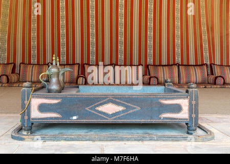 Arab tent interior with fire pit and coffee pots Stock Photo - Alamy