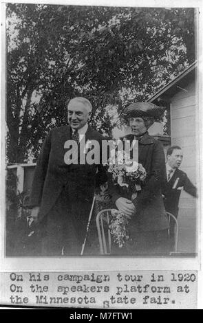 Warren Harding, three-quarters length, standing in auto, facing ...