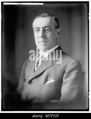 This portrait shows Woodrow Wilson, the 28th U.S. president, offering a ...