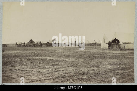 This historical photograph depicts the winter quarters of officers from ...