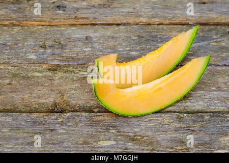 Yummy melon slices on table, closeup Stock Photo - Alamy