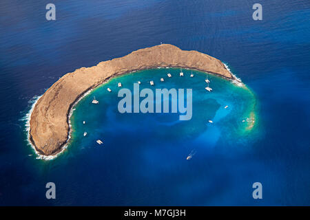 Molokini Crater, aerial shot of the crescent shaped islet at mid ...