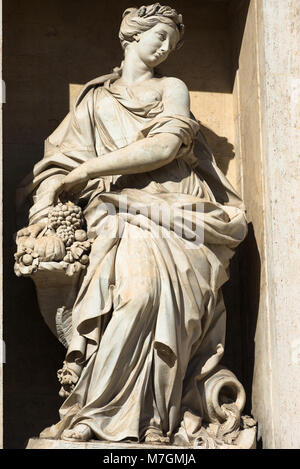 Trevi Fountain Statue of Abundance sculpture in Rome, Italy Stock Photo ...
