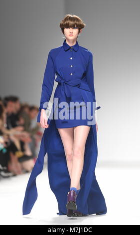 Lisbon, Portugal. 10th Mar, 2018. A model presents a creation of ...