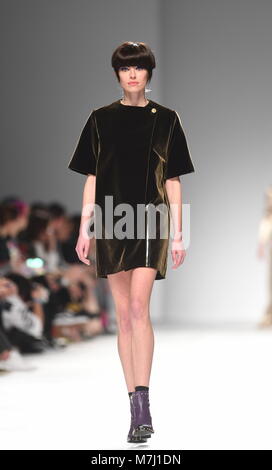 Lisbon, Portugal. 10th Mar, 2018. A model presents a creation of ...