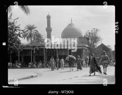 A view of Baghdad, Iraq, featuring street scenes and local types, with ...