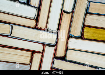 stack of old books pastel colors Stock Photo - Alamy