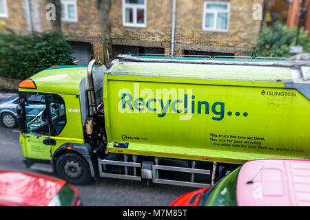 An Islington Council recycling lorry making its weekly collection in a ...