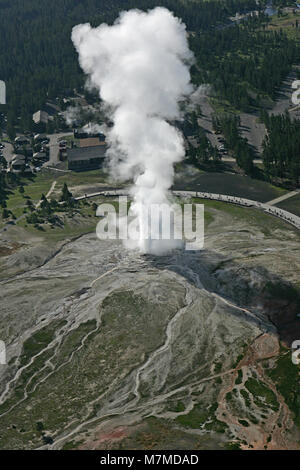 Aerial view of the Old Faithful geyser hot water eruptions at Wyoming ...