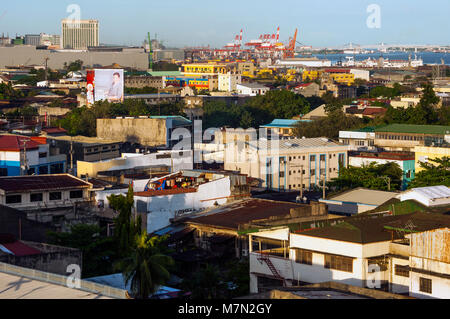 Aerial view of Cebu City looking northeast, with port, Robinsons ...