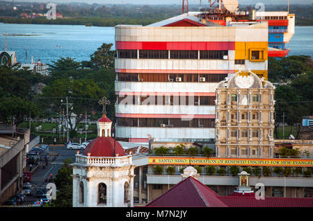 Aerial view of Cebu City looking northeast, with port, Robinsons ...