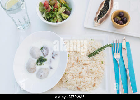 Shakriya - lamb meat in yoghurt sauce, served with white rice and salad ...