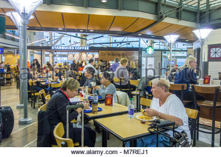 Food court at Vancouver International Airport (YVR). People sitting ...