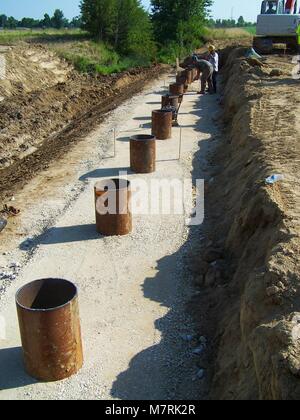 slab-on-grade foundation on construction site. busy construction site ...