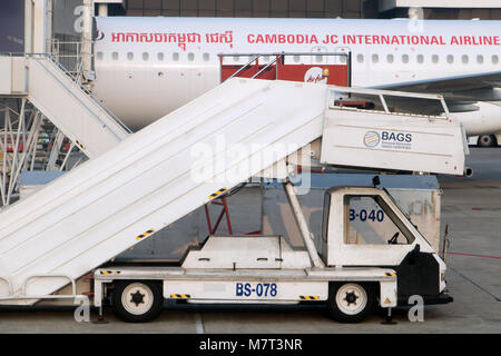Passenger ladders for boarding passengers in an airplane. Airplane ...