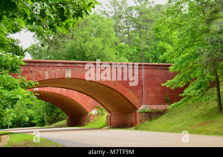 Built solidly from red brick, these bridges span this country road here ...