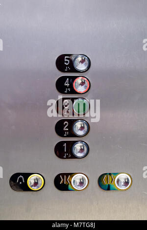 Elevator Control Panel that Features a Down Arrow Indicator for User ...