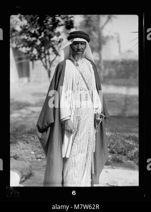 Aref el Aref, alongside Bedouin sheikhs, is depicted in this historical ...