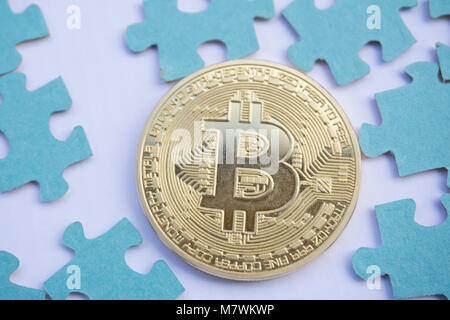 gold bitcoin and puzzles Stock Photo - Alamy