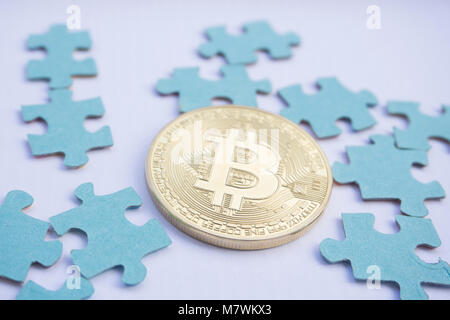 gold bitcoin and puzzles Stock Photo - Alamy