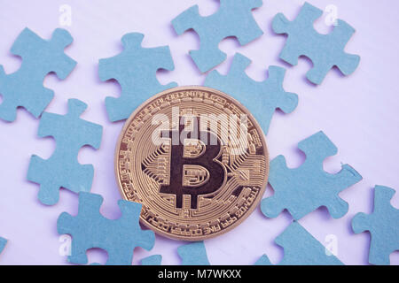gold bitcoin and puzzles Stock Photo - Alamy