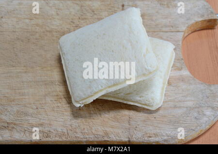 sandwich on wooden chop block Stock Photo - Alamy