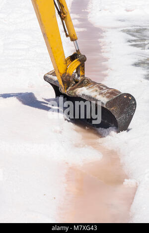 scraper at work at saltworks of Trapani in Sicily in Italy Stock Photo ...