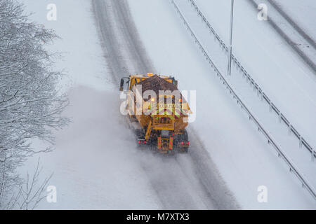 Gritting lorry spreading grit on Dartmoor Devon at Haytor Stock Photo ...