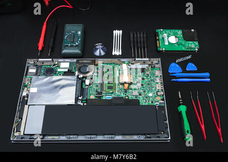 tech support disassembled computer parts repair Stock Photo - Alamy