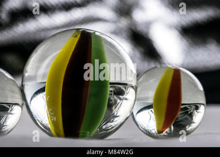 Colorful glass marbles macro close up Stock Photo - Alamy
