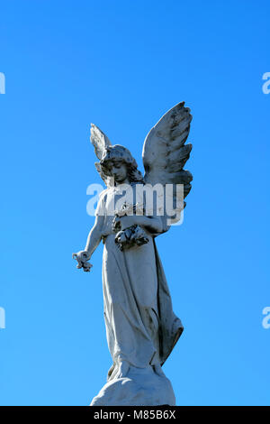 Blue sky and marble statue of female figure pensive thoughtful sad on ...