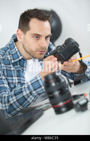 engineer inspecting an object Stock Photo - Alamy