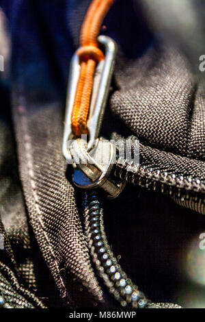 Close up old zipper open on jacket Stock Photo - Alamy