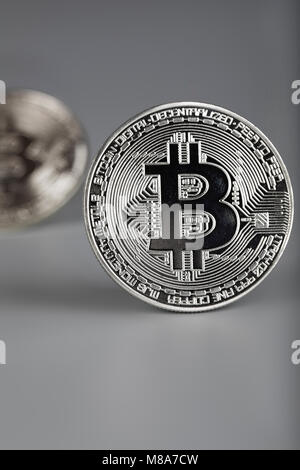 Closeup of digital asset -bitcoin. Gray background Stock Photo - Alamy