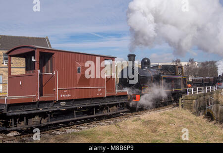 A small tank engine pulls into the railway station at Halesworth ...