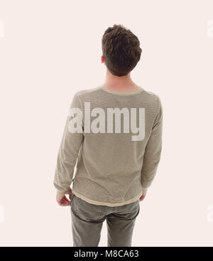 modern young man looks confidently forward. Photo in full length Stock ...