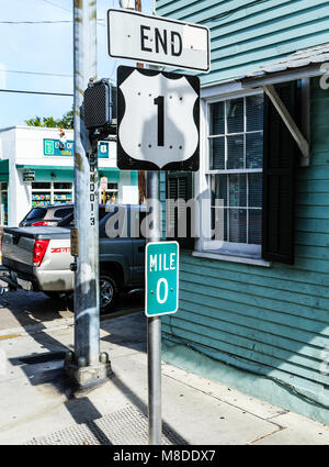 beginning of US 1 highway in Key West at Whitehead street under blue ...