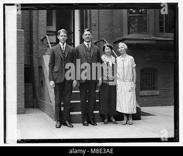 A photograph of Secretary Wilbur and his wife with their two children ...