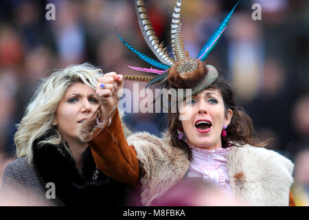 Racegoers cheer during Ladies Day of the 2018 Cheltenham Festival at ...