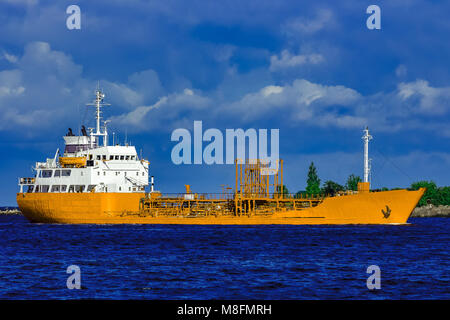 Yellow cargo tanker ship moving at the clear summer day Stock Photo - Alamy