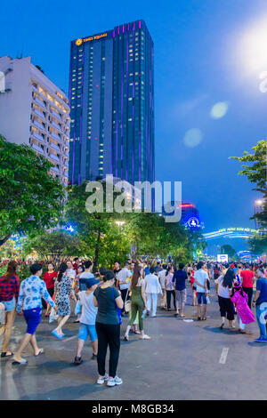 People gather to celebrate the New Year at the Zojoji Buddhist temple ...