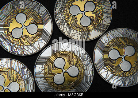 Ripple coin, XRP token, cryptocurrency on US 100 dollar background for ...